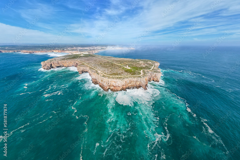 Spectacular view of Sagres fortress peninsula with a lighthouse on the ...