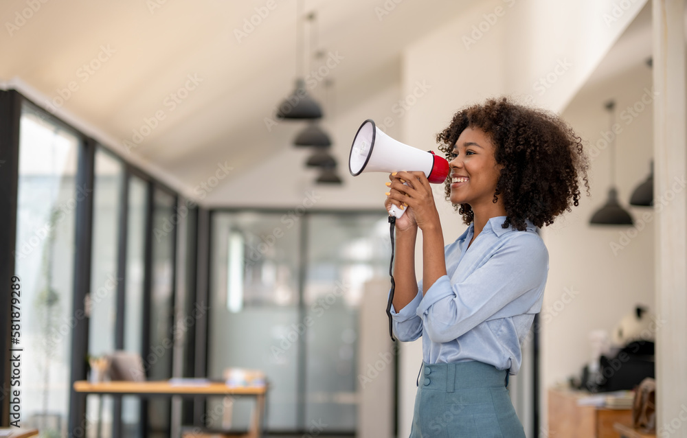 business woman shouting loud holding a megaphone, expressing success ...