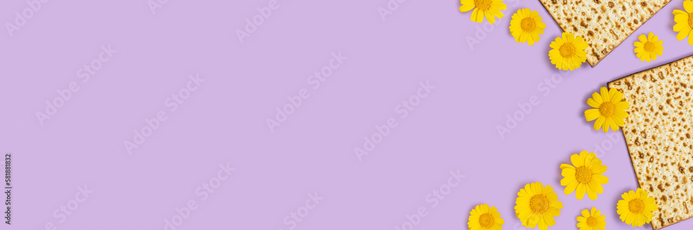 Yellow flowers and matzah for Jewish holiday Pesach (Passover) on ...