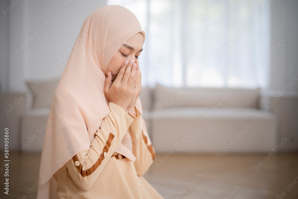 Crop woman do player for god, muslim girl cover her face with two hand ...