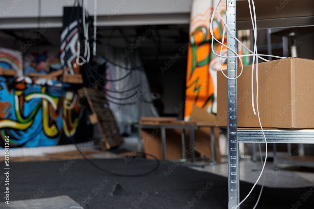 Destroyed structure of messy building covered in debris and neglect ...