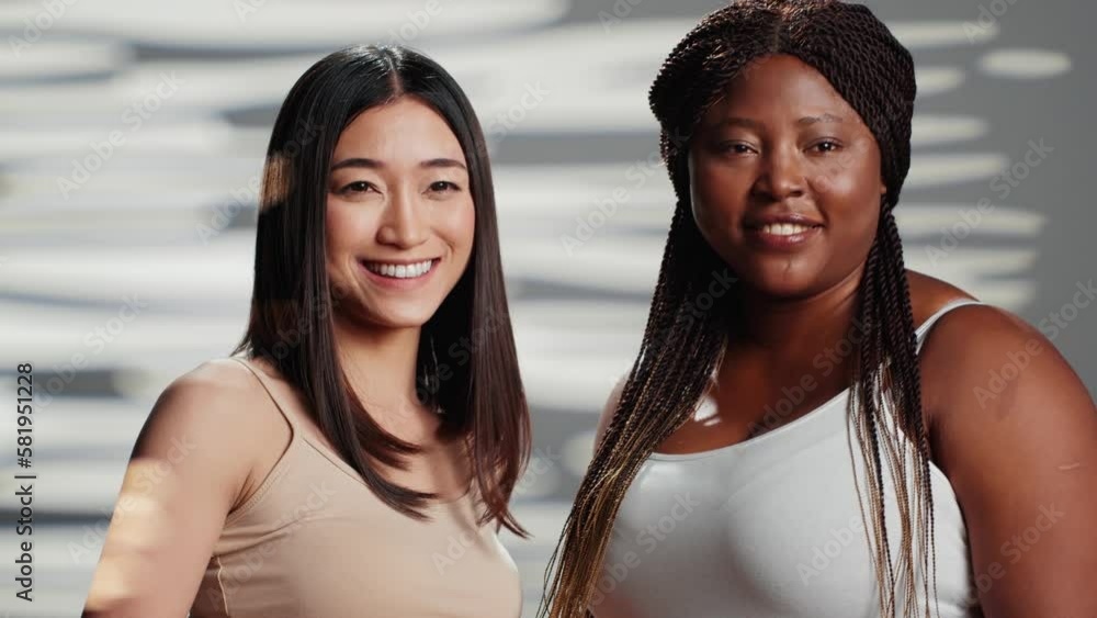 Diverse women hugging and expressing self love, doing skincare and ...