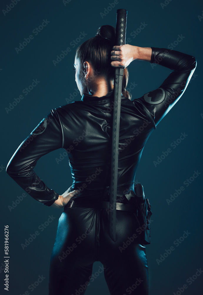 Woman, warrior and back of vigilante with sword in cosplay for battle ...