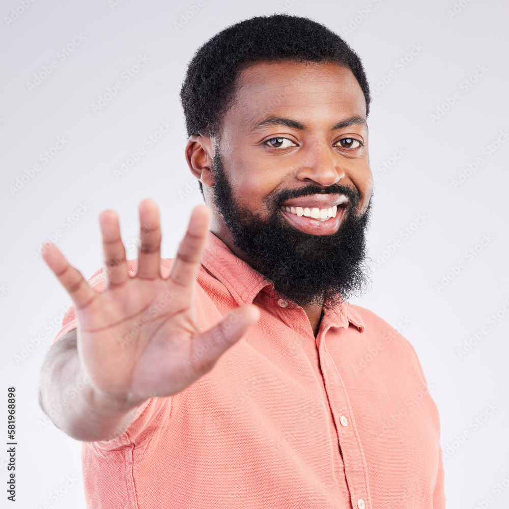 Black man, hand and stop in studio portrait with smile, sign language ...