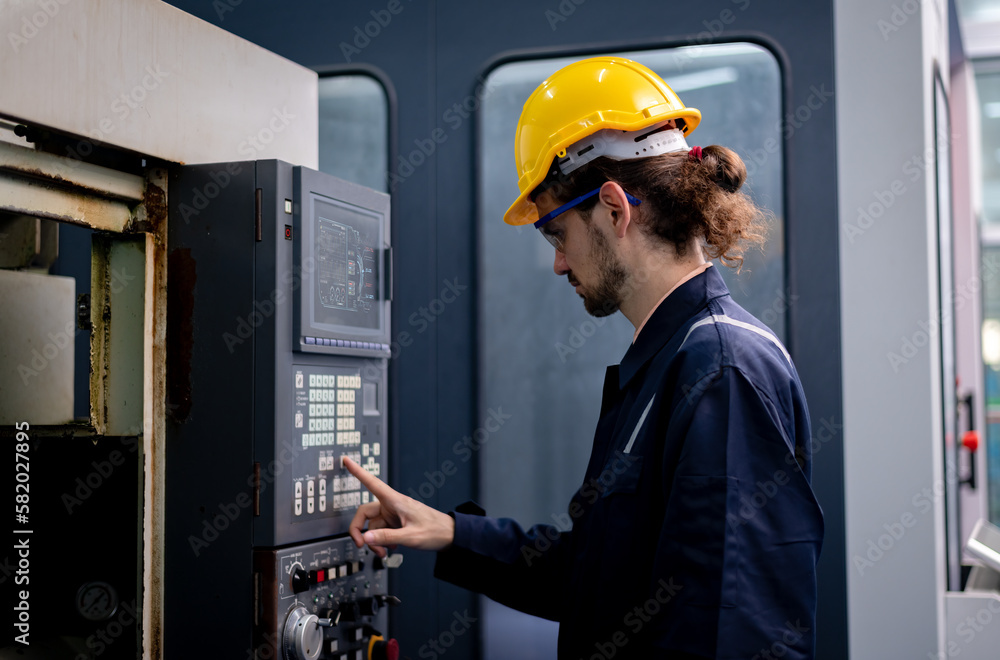 Engineer technician under control digital factory production technology ...