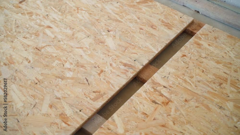 Fitting an oriented strand board subfloor on the second floor of a ...