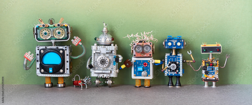 Foto de Five steampunk toy robots and small dog. Metal copper silver ...