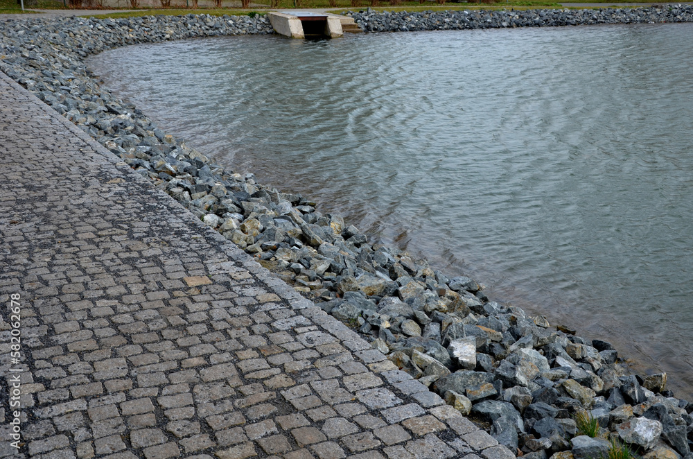 pond sluice, water reservoirs with regulation and concrete dam shaft ...