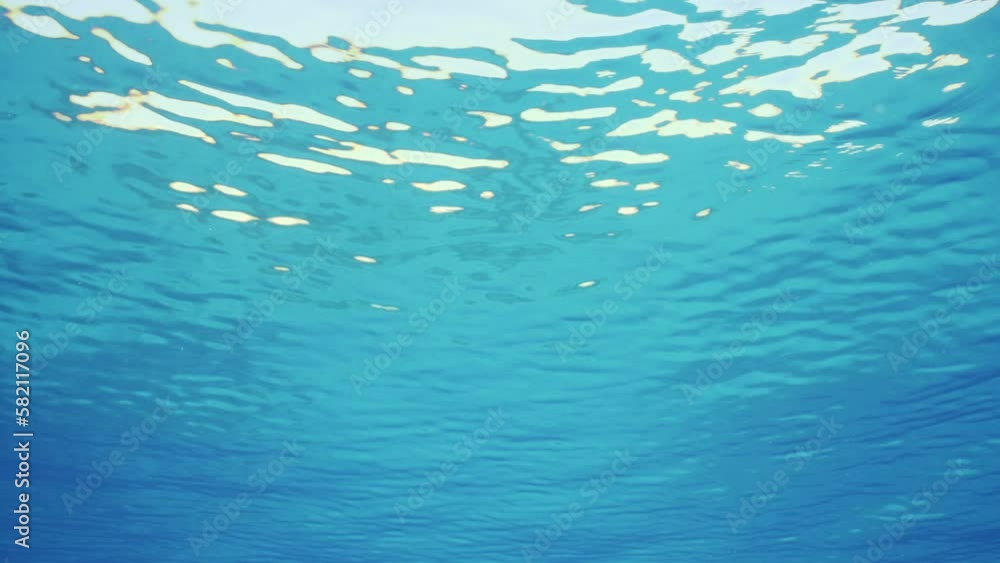 Video Stock Underwater view of calm blue water surface, Slow motion ...