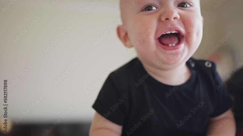 baby kid is delighted. baby son laughs with mom. Joy together: mom and ...