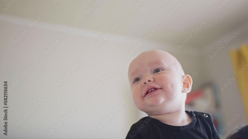 baby kid is delighted. baby son laughs with mom. Joy together: mom and ...