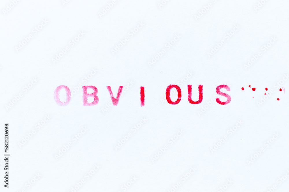 Red color ink rubber stamp in word obvious on white paper background ...