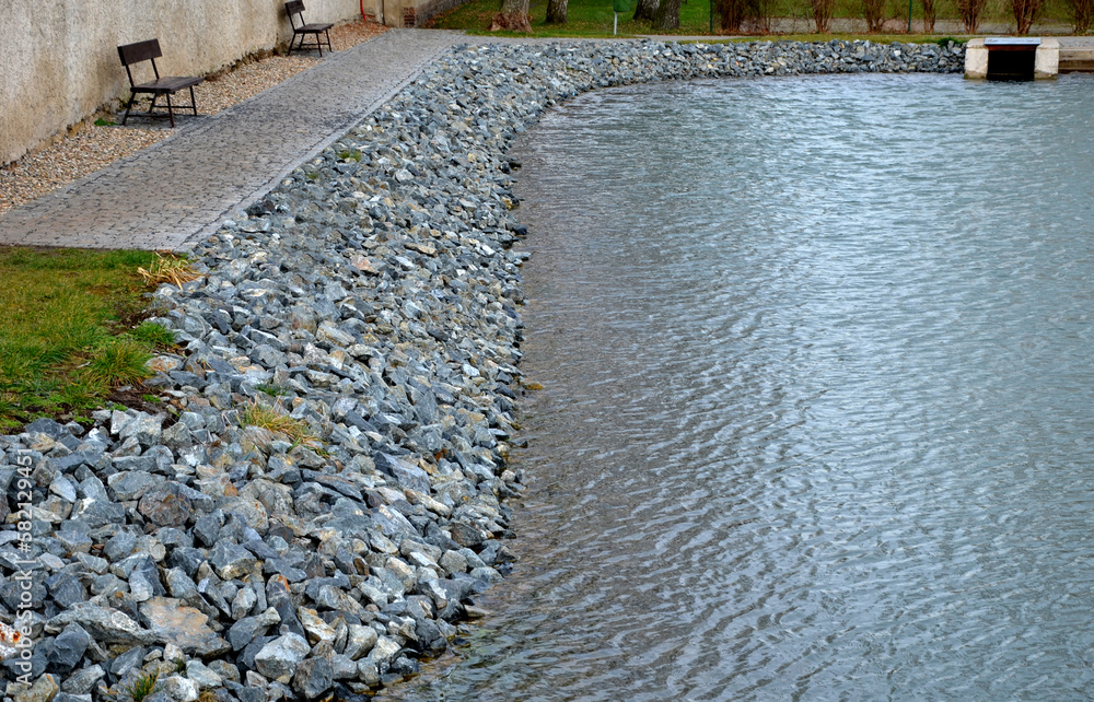 pond sluice, water reservoirs with regulation and concrete dam shaft ...