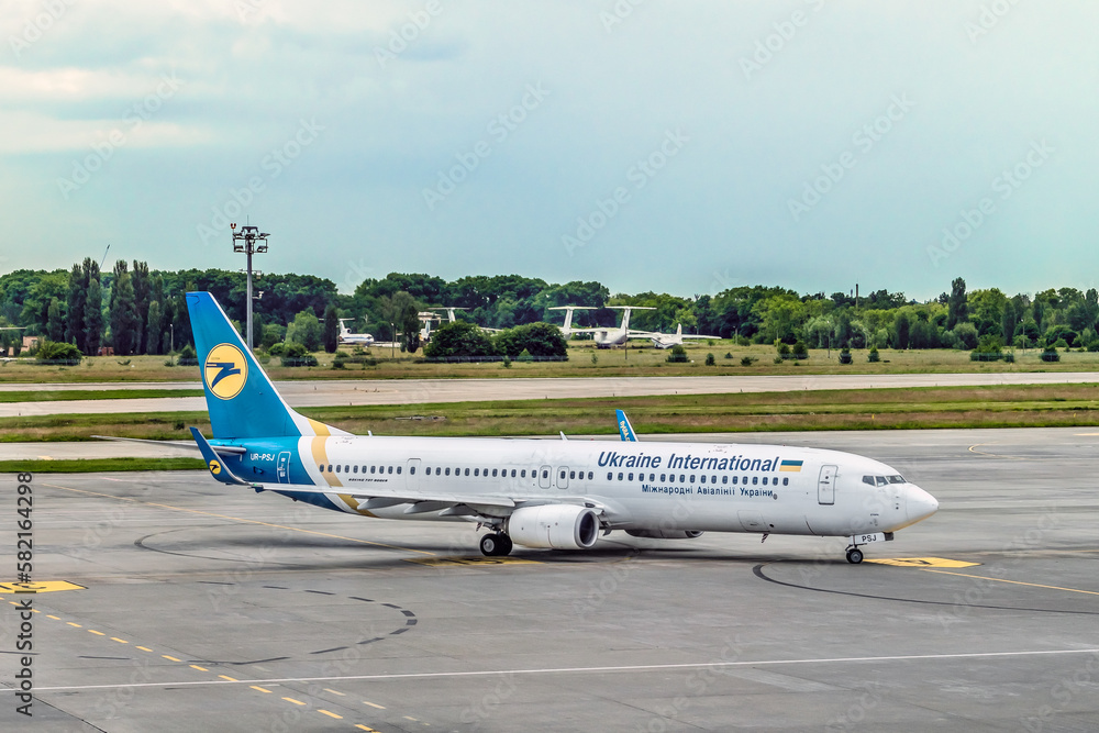 Kyiv, Ukraine - June 16, 2021: UIA plane on the runway in Boryspil ...