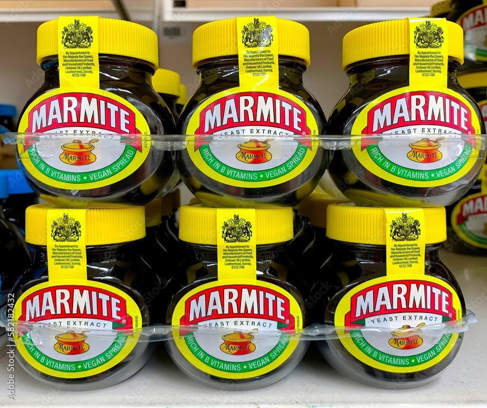 Jars of Marmite yeast extract spread in a clear plastic tray for sale ...