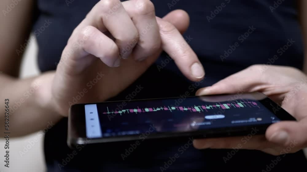 Vídeo do Stock: Trader Viewing Cryptocurrency Candlestick Chart on ...