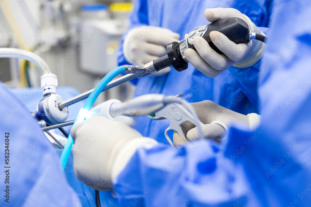 A team of doctor or surgeon did surgery inside operating room in ...