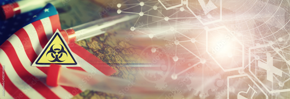 American flag, test tubes and biohazard sign. The concept of American ...