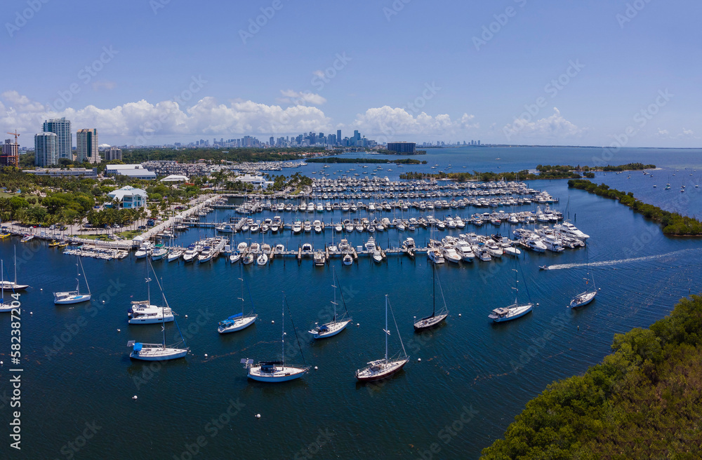 Dinner Key Marina and Coconut Grove Sailing Club against Miami Florida ...