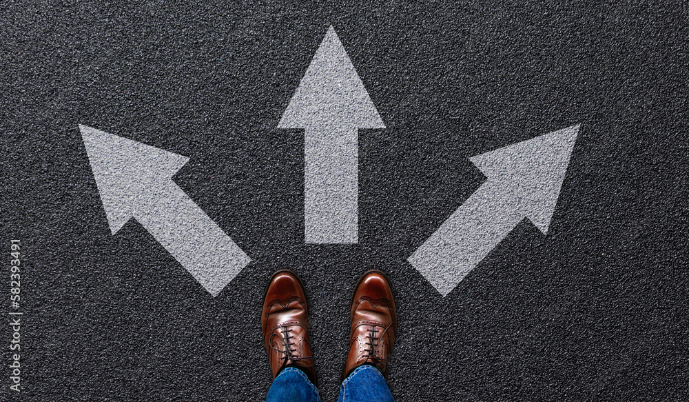 Businessman Legs Standing on three arrow direction in Asphalt Road ...