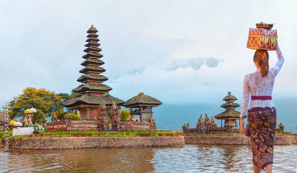 Balinese girl in traditional costume - Pura Ulun Danu Bratan temple ...