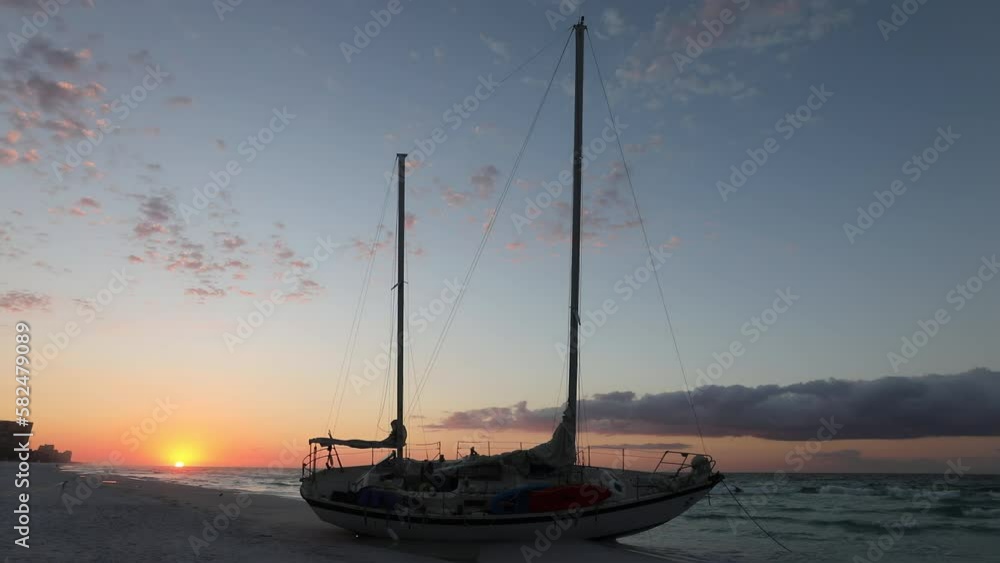 A sailboat that had washed up on the beach in Destin Florida after ...