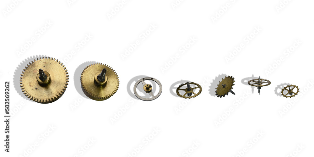 Gear wheels and other elements of clock mechanism isolated on the ...