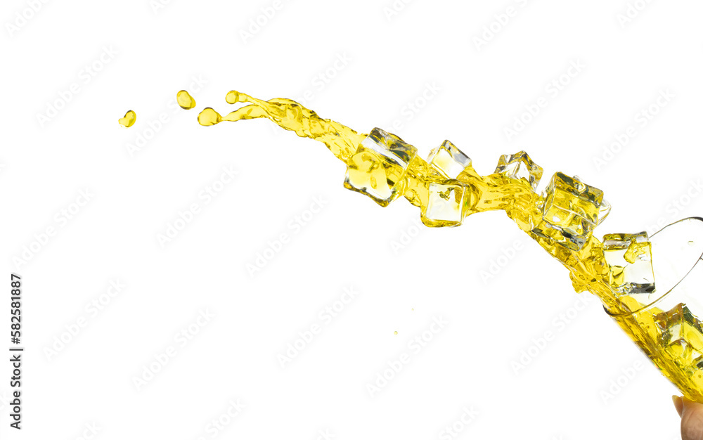 Pouring lime juice down to glass, lime juice fall down in yellow liquid ...