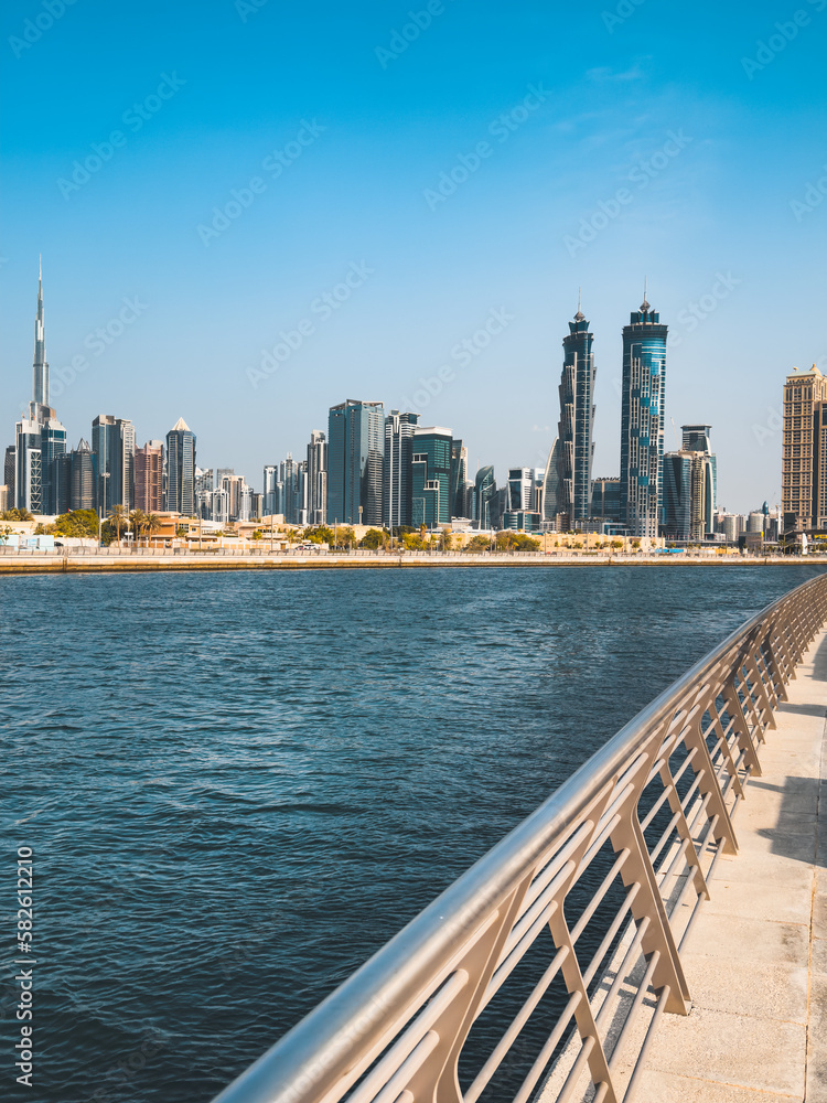 Dubai Water Canal Tolerance Bridge, pedestrian bridge with water taxi ...