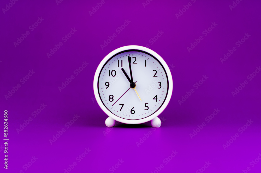 White clock on purple background, time concept Time planning Stock ...