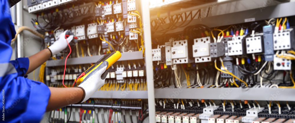 Electricity or electrical maintenance service, Electrician hand holding ...