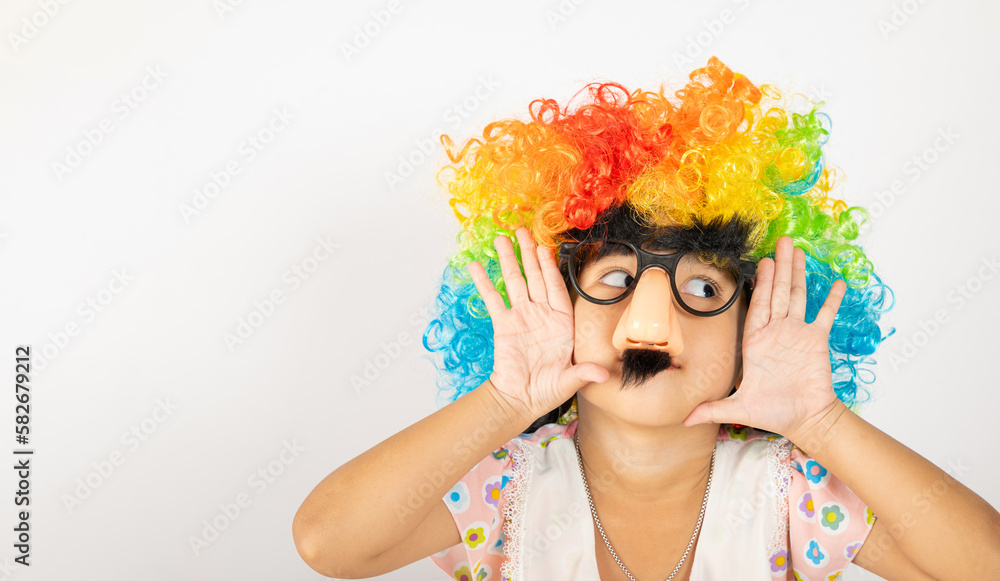 April Fool's Day. Two brothers funny kid little girl clown wears curly ...