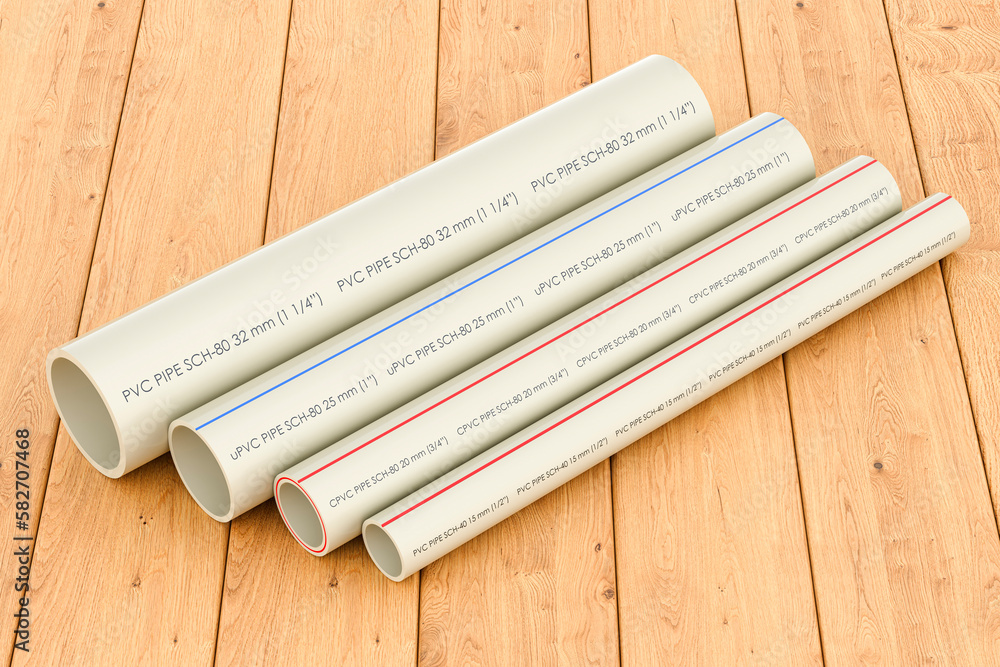 PVC pipes, composite pipe, uPVC pipe, cPVC pipe on the wooden table, 3D rendering Stock ...