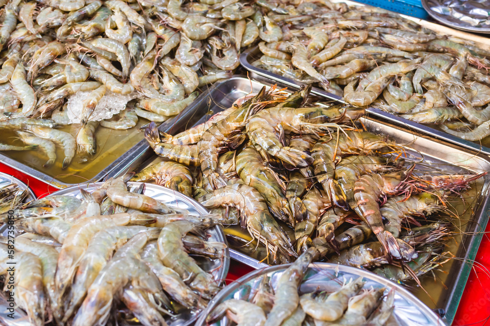 Super Jumbo Shrimp in ice on display at a fish market. Stock Photo ...