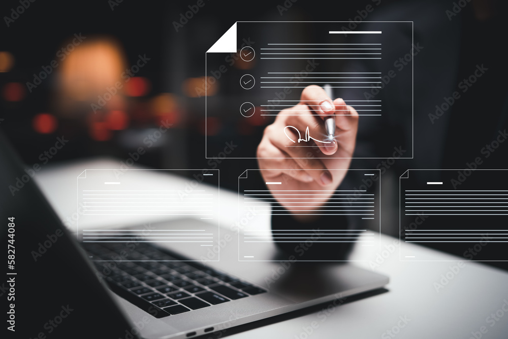 Electronic signature concept, business people sign electronic documents ...