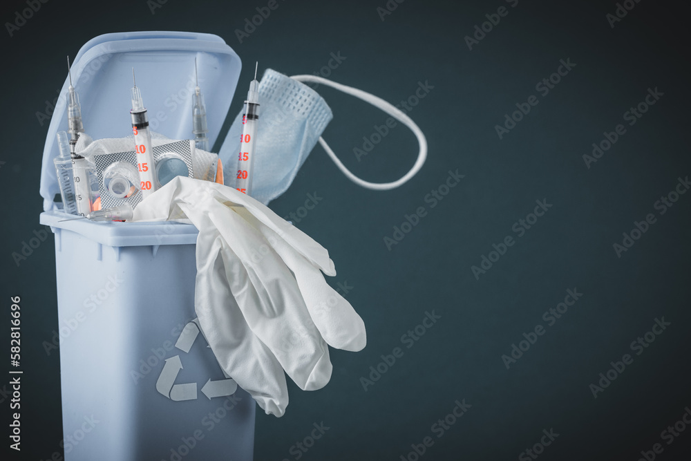 Medical waste concept, Open garbage full of pills, syringes, bandages ...