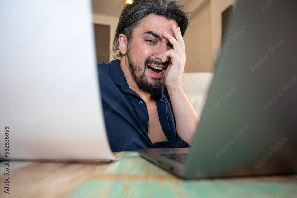 Handsome young man desperate over a letter received Stock Photo | Adobe ...