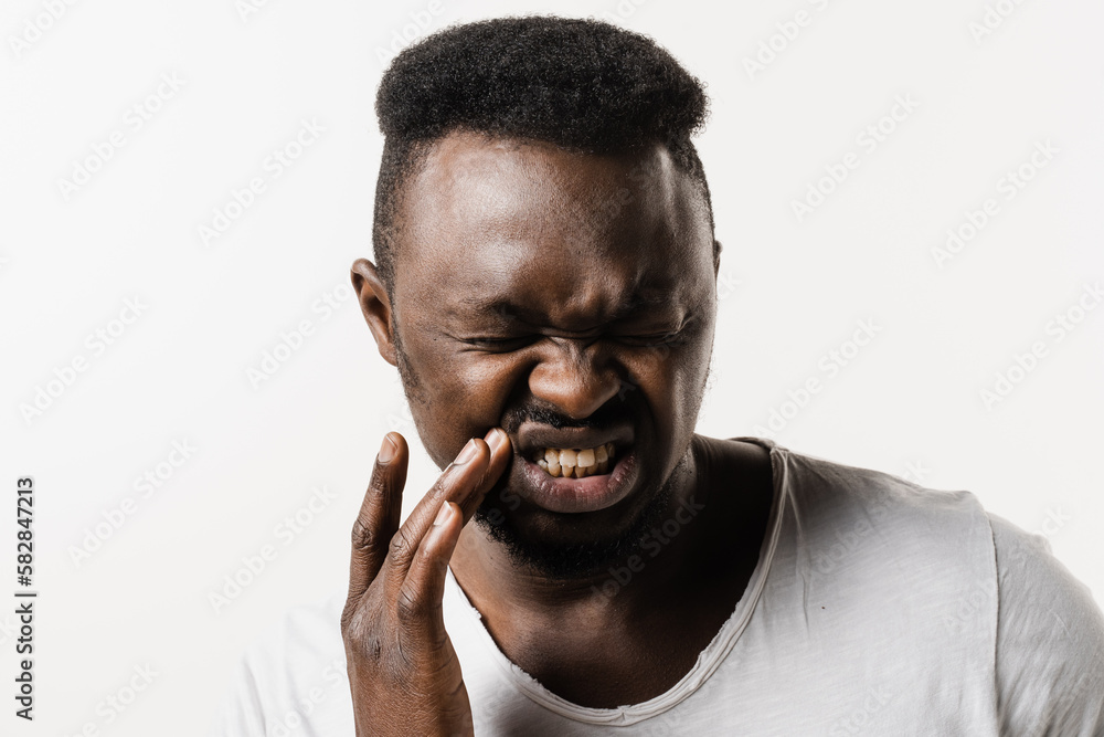 Zdjęcie Stock: Toothache of african man on white background. African ...