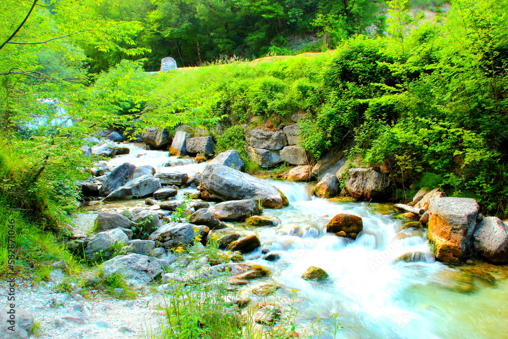 Captivating view at the powerful waters of the Ambro river streaming ...