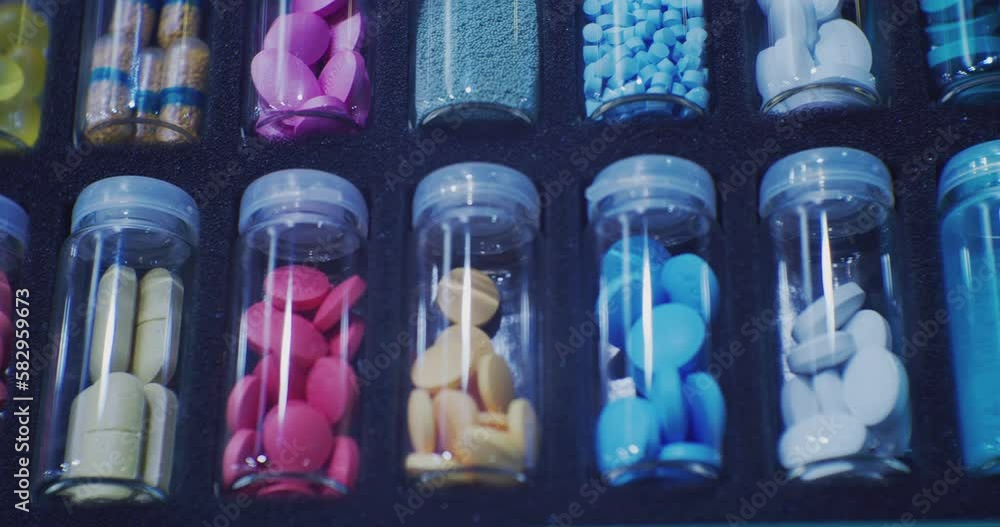 Stockvideo pharmaceutical industry.drugs of different shapes and colors ...