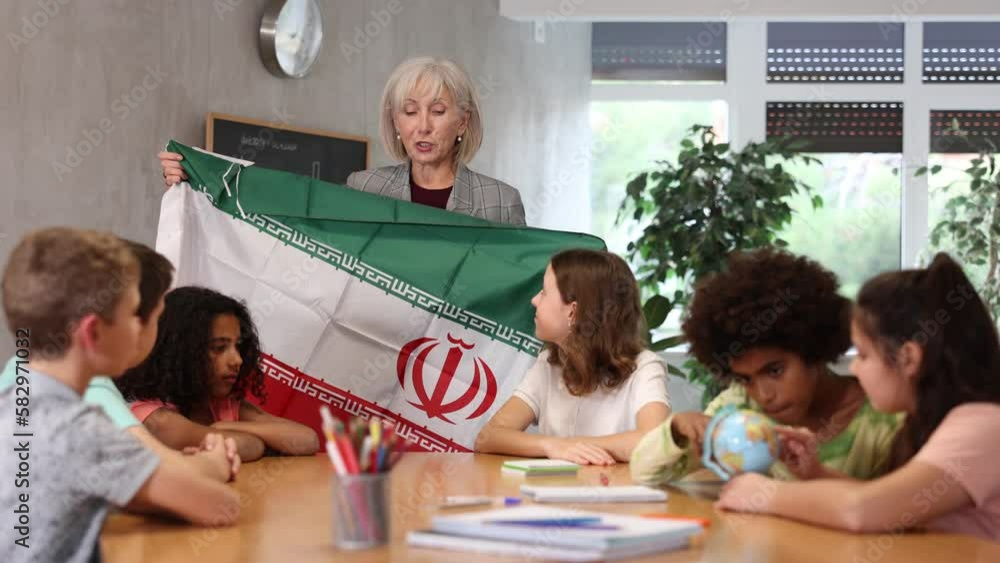 Video „Female high school teacher, conducting a lesson in the classroom ...