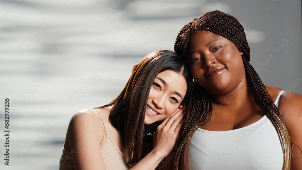 Interracial girls expressing body positivity and confidence, group of ...