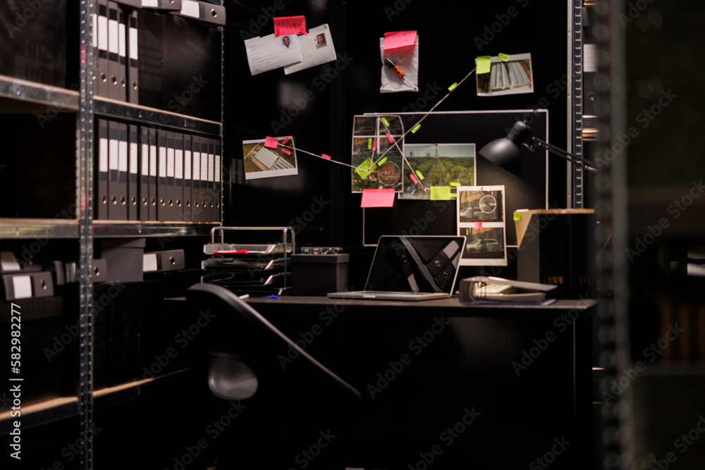 Private investigator office with detective board and desk at night time ...