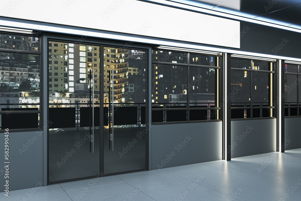 Contemporary storefront with empty white wide mock up banner and night ...