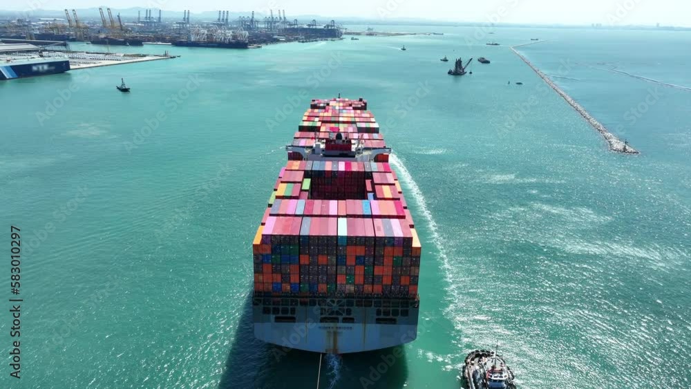 Stern of cargo ship carrying container and running for import goods ...