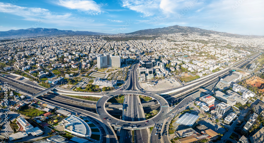 Aerial drone panoramic view of multilevel junction ring road as seen in Attiki Odos toll road ...