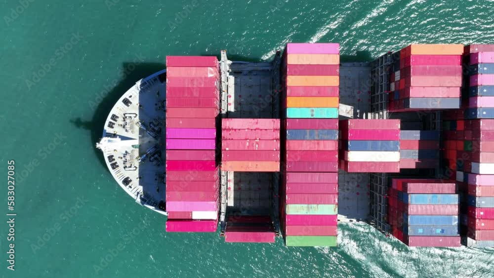 Aerial top view of Cargo Container Ship with Tug boat carrying ...