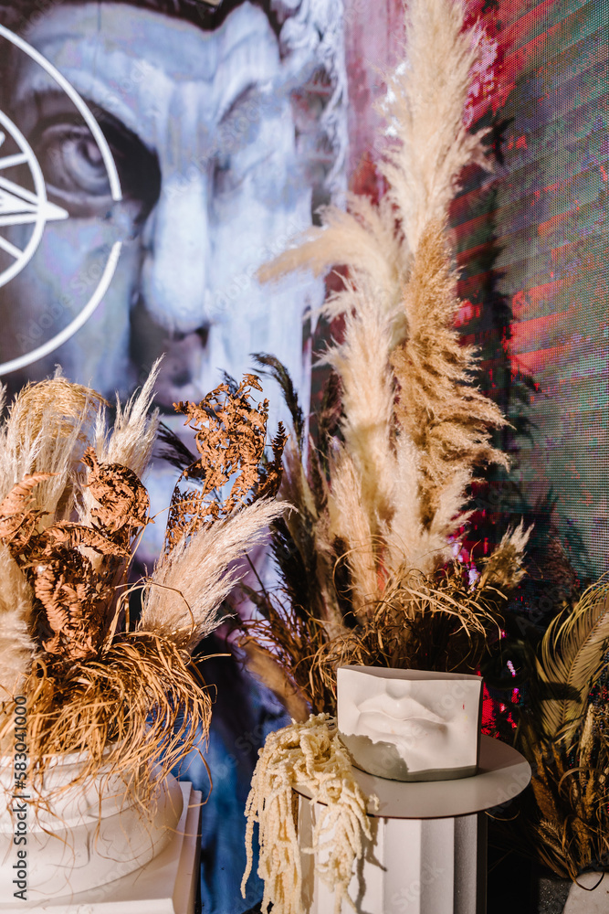 Plaster lips. Classical Sculpture plaster fragment of lips. Dry leaves ...