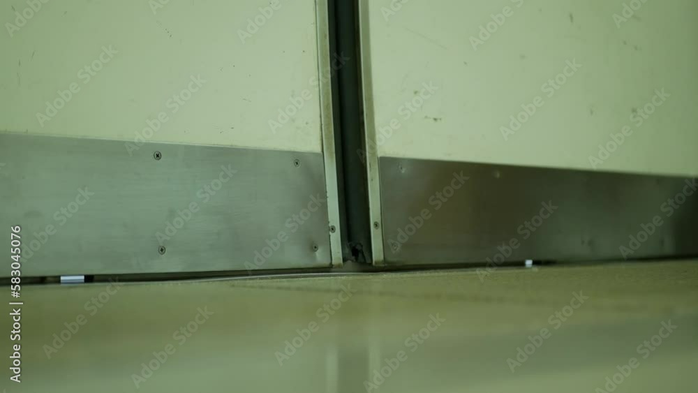 Low angle view to the train door inside train commuter while train door ...