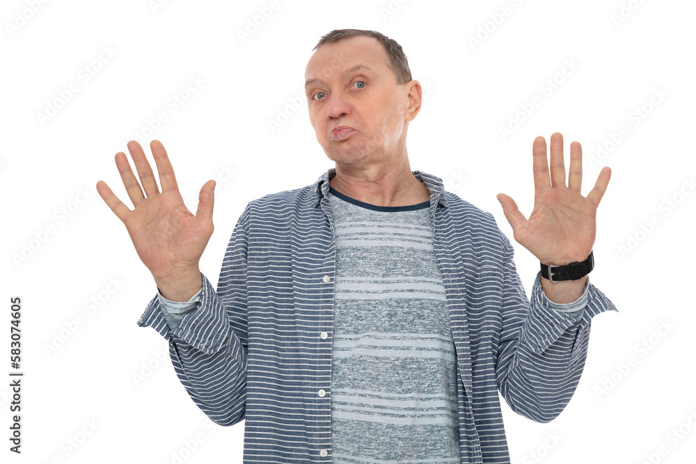 Serious, concerned sixty year old man grimace on his face lifting palms ...